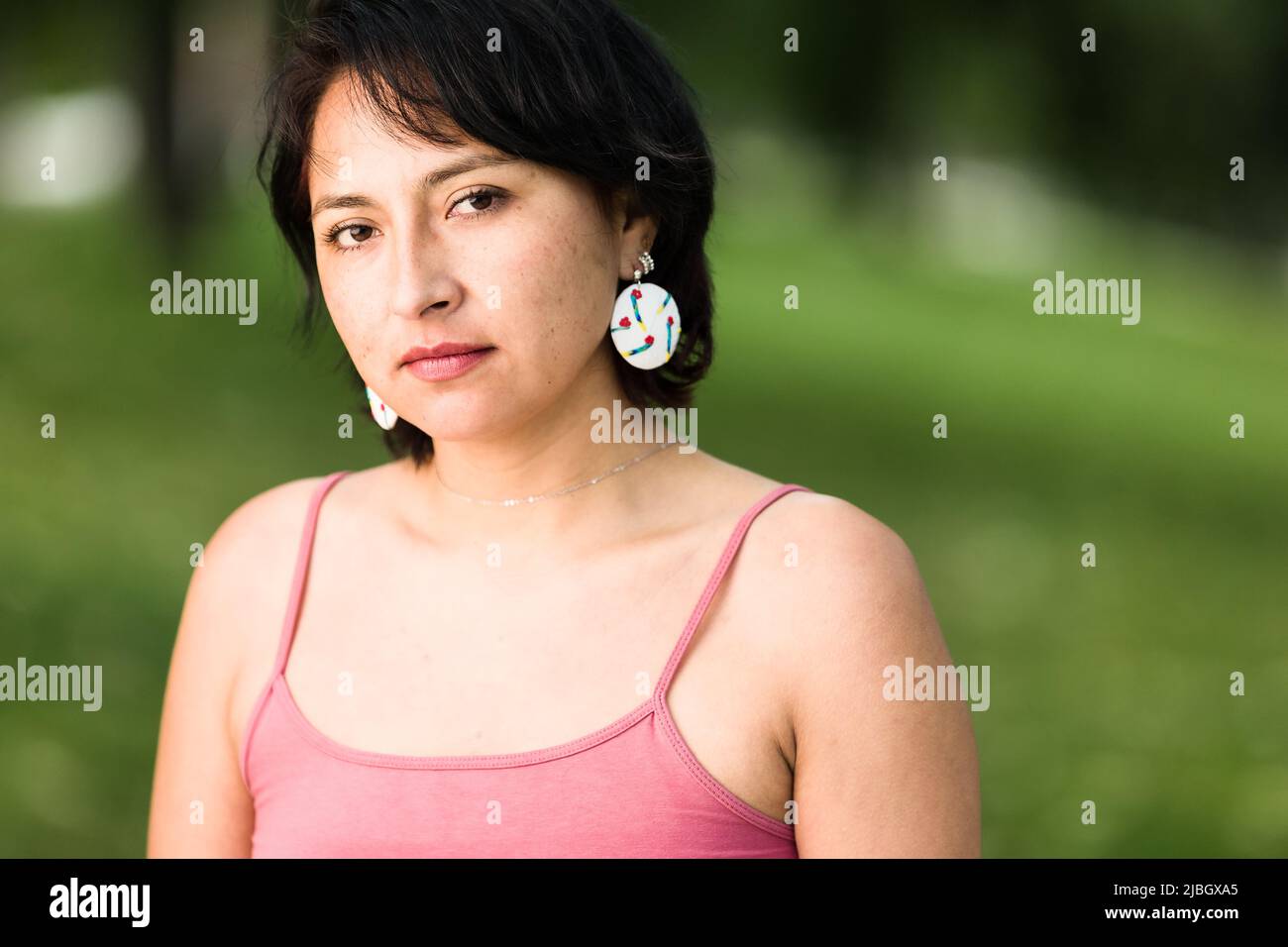 Latin America Bolivian woman with traditional pattern cloth mask ...