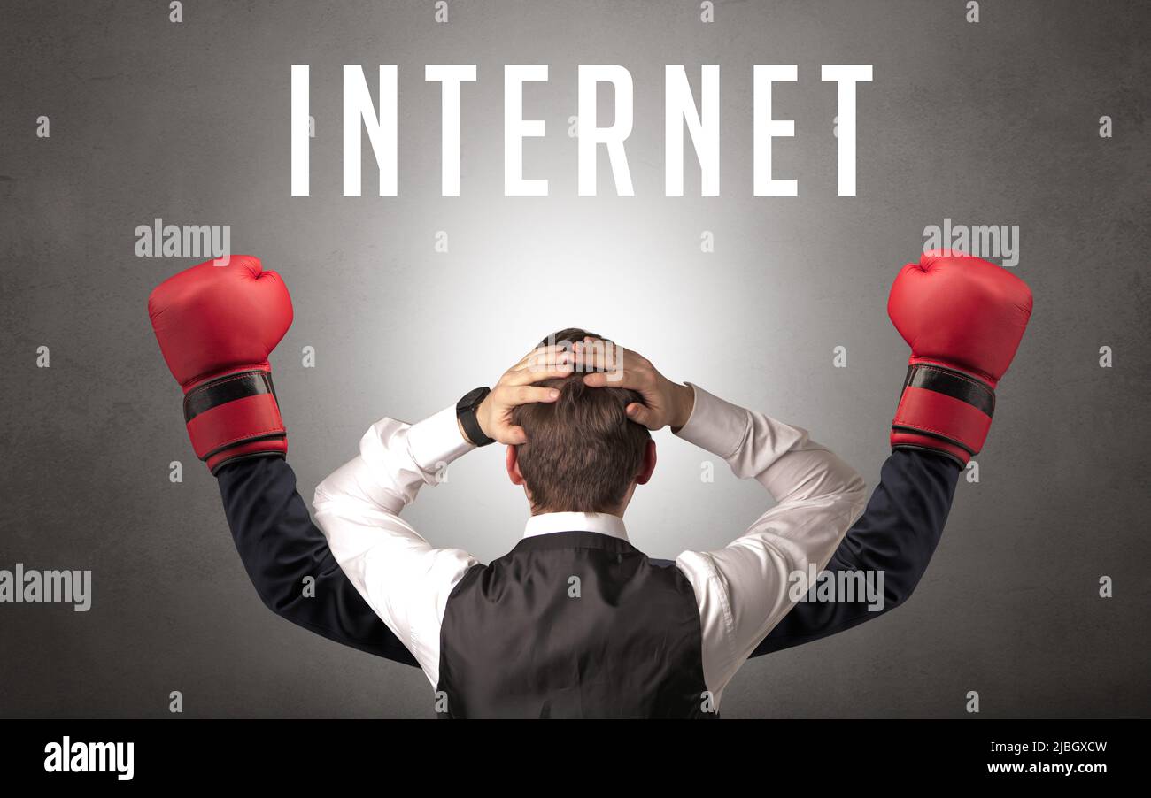 Rear view of a businessman with inscription Stock Photo - Alamy