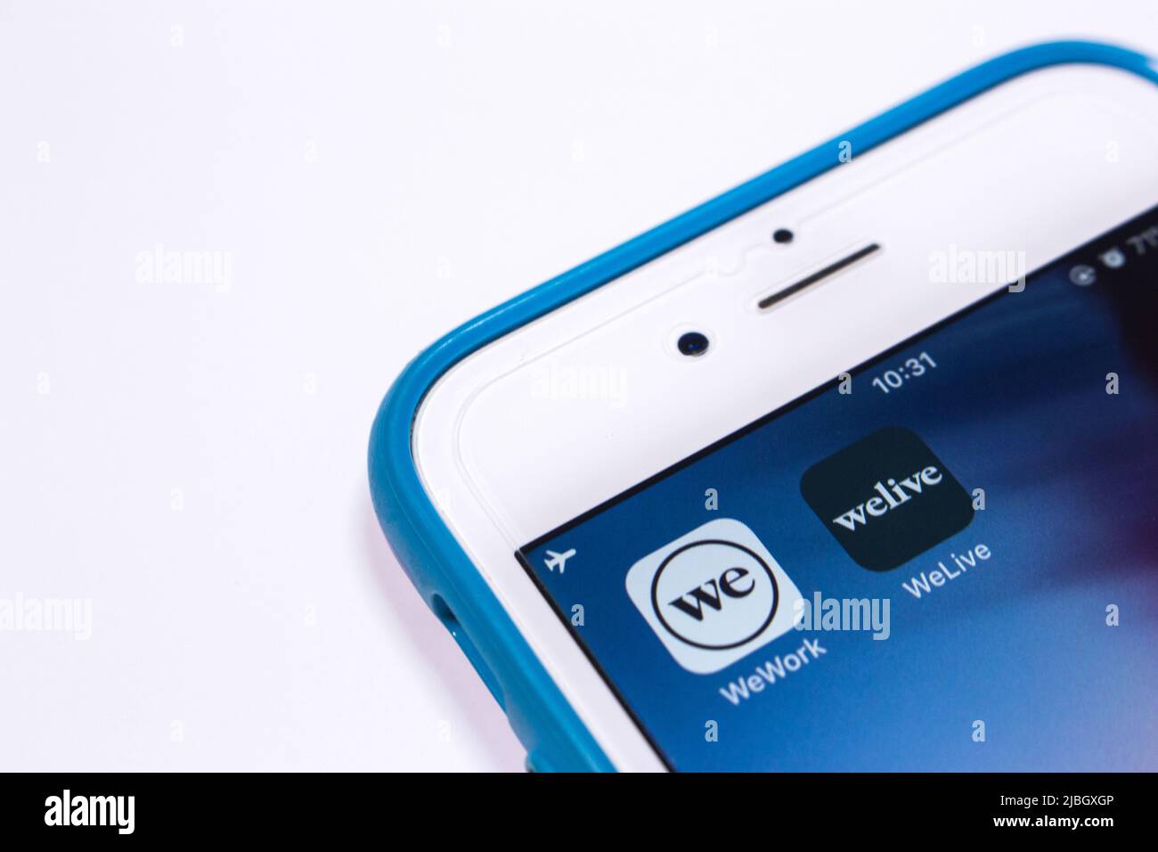 WeWork & WeLive app on an iPhone. WeWork is an US real estate company ...