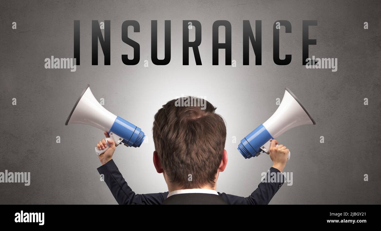 Rear view of a businessman with inscription Stock Photo - Alamy