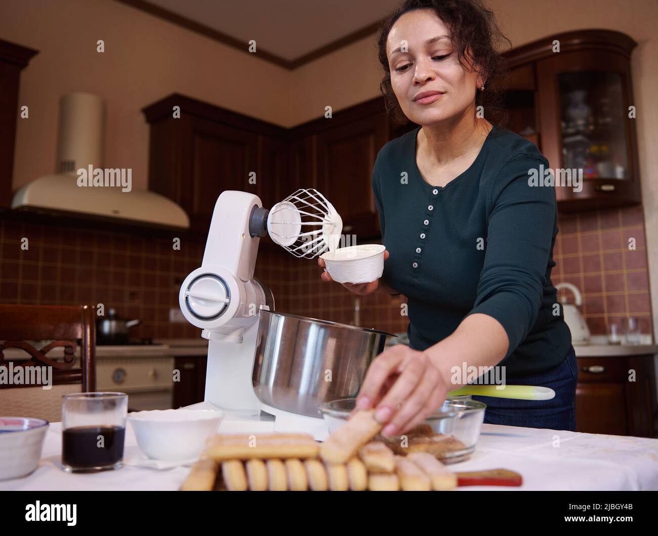 Woman eat mascarpone mousse dessert hi-res stock photography and images ...