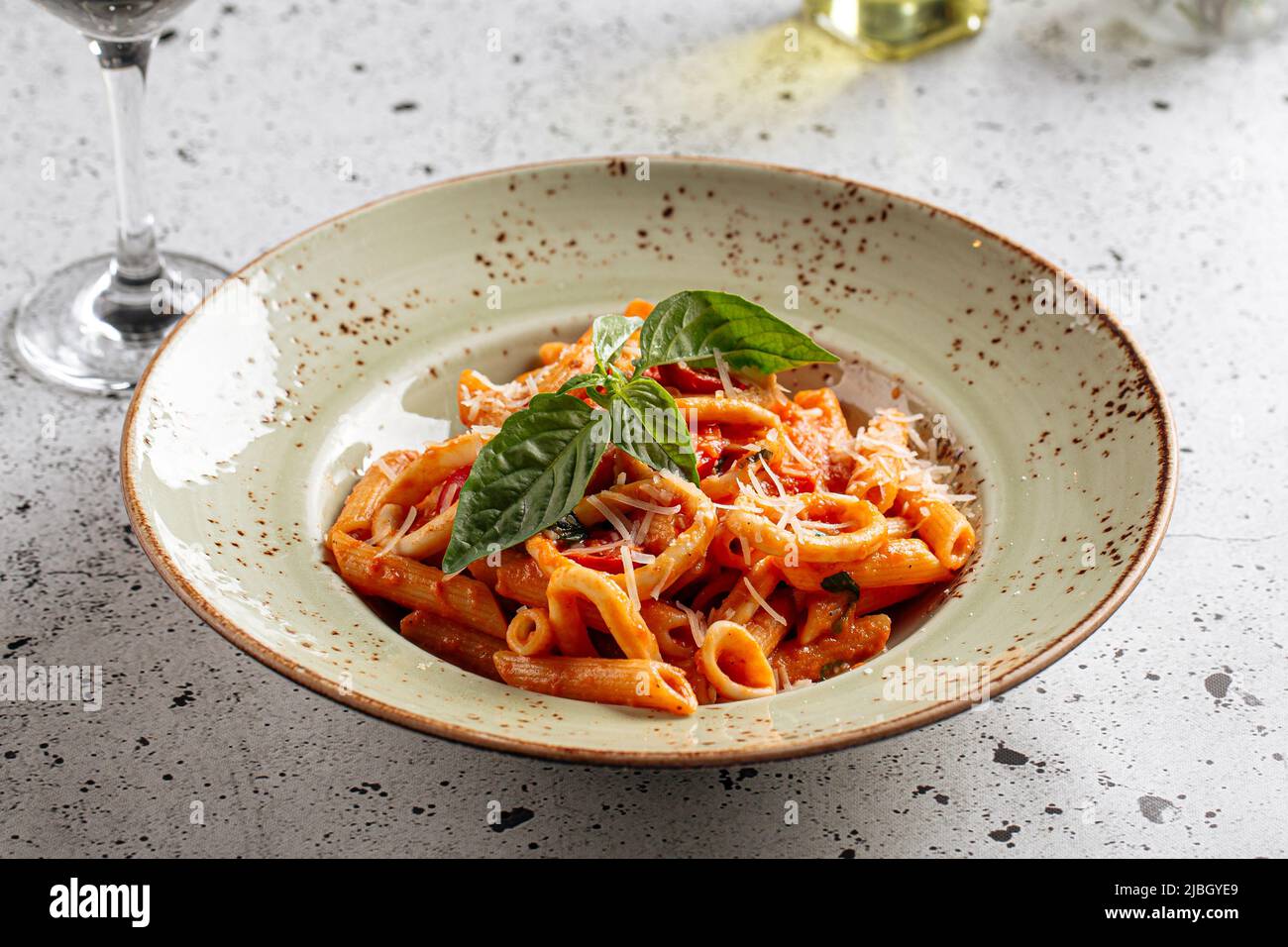 Side view on seafood penne pasta dish Stock Photo - Alamy