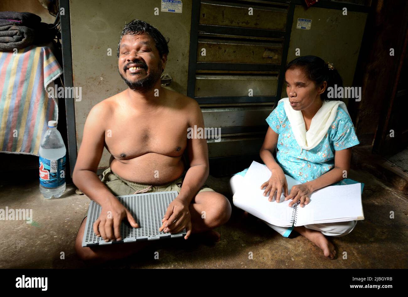 The blind family members are learning with braille medium in their home ...