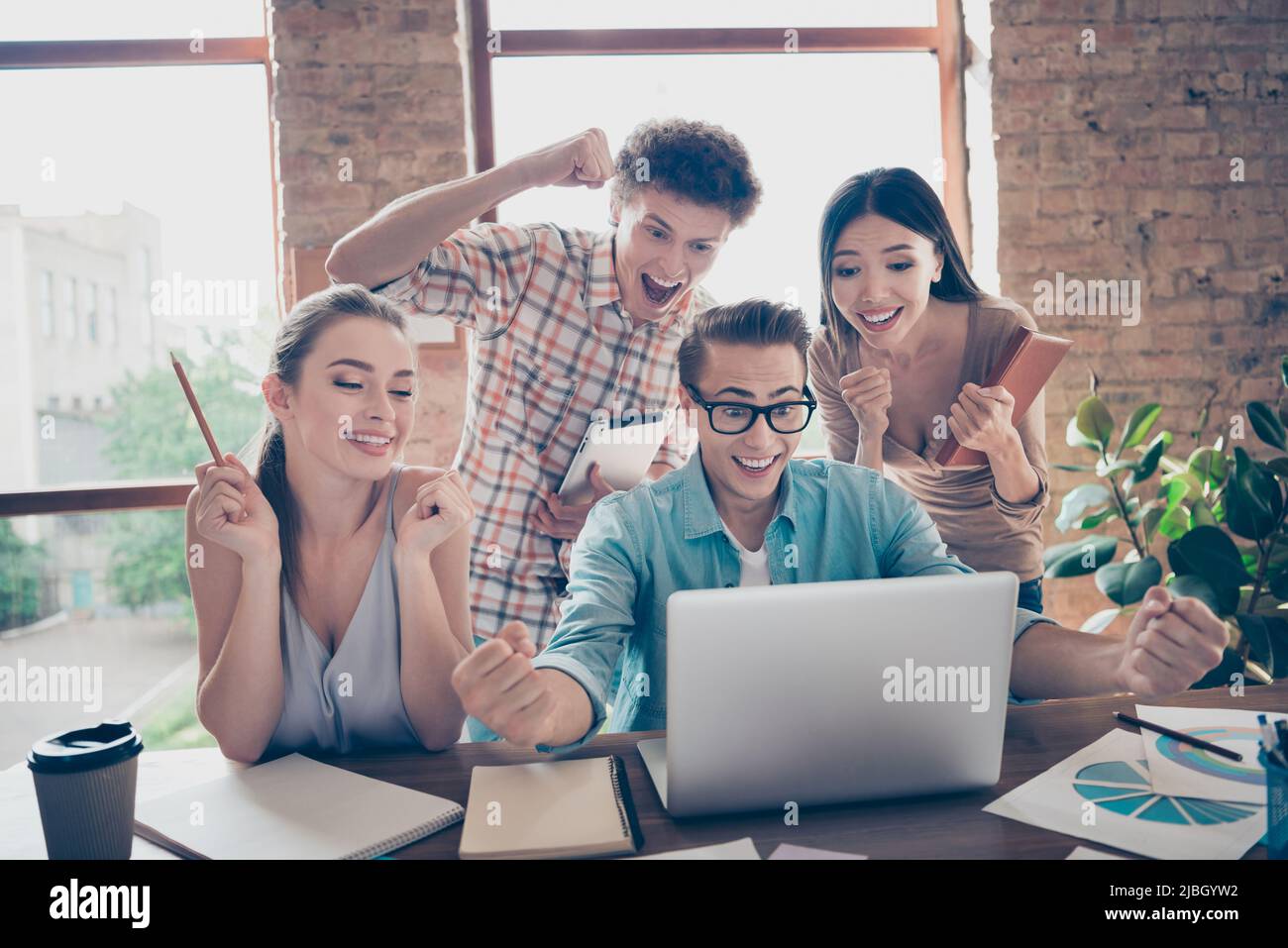 Photo of cheerful overjoyed group of high schoolers happy to pass exam ...