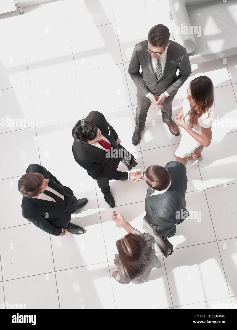 top view. handshake business partners at the meeting Stock Photo - Alamy