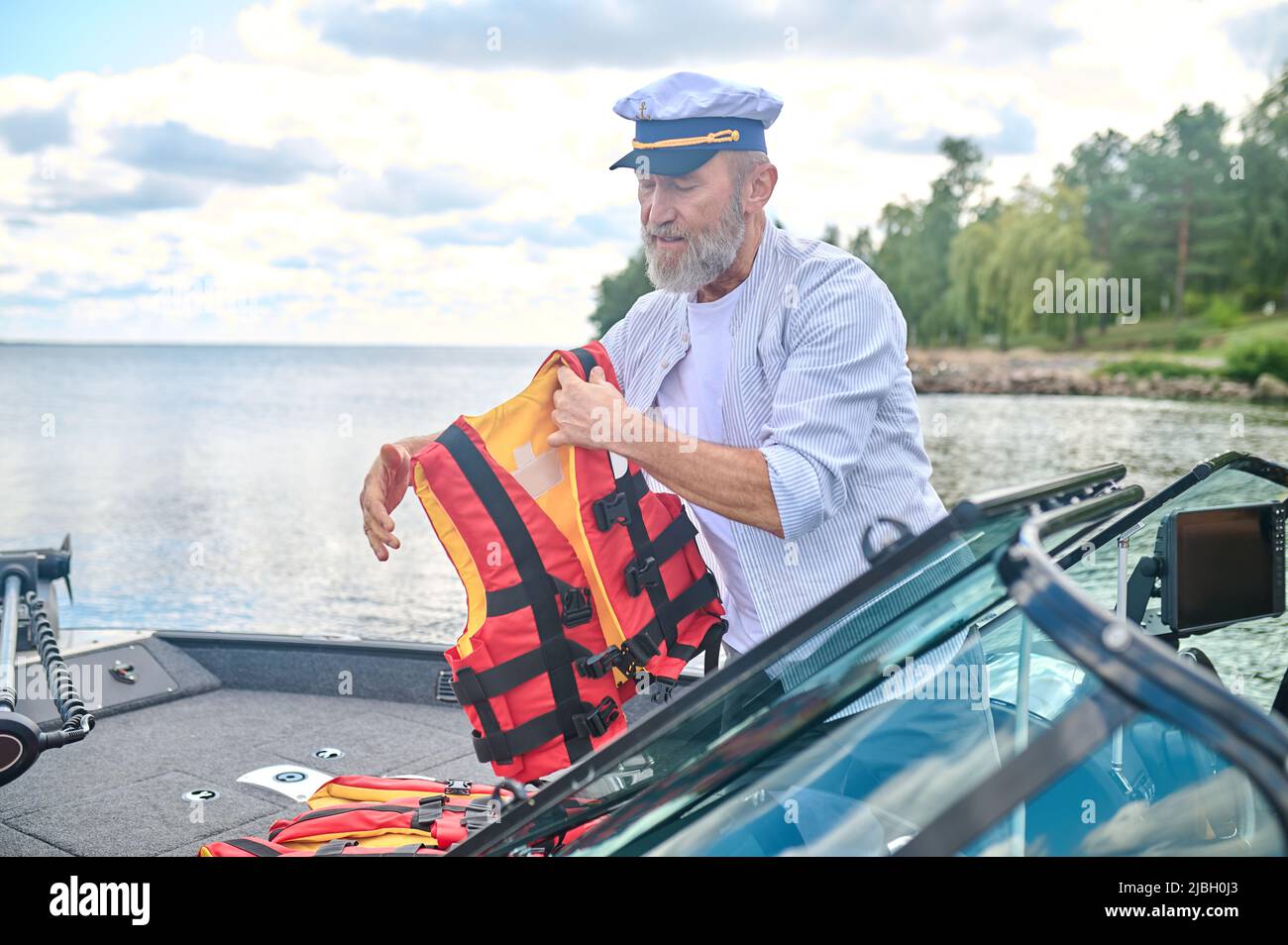 Yacht captain with life vest hi-res stock photography and images - Alamy