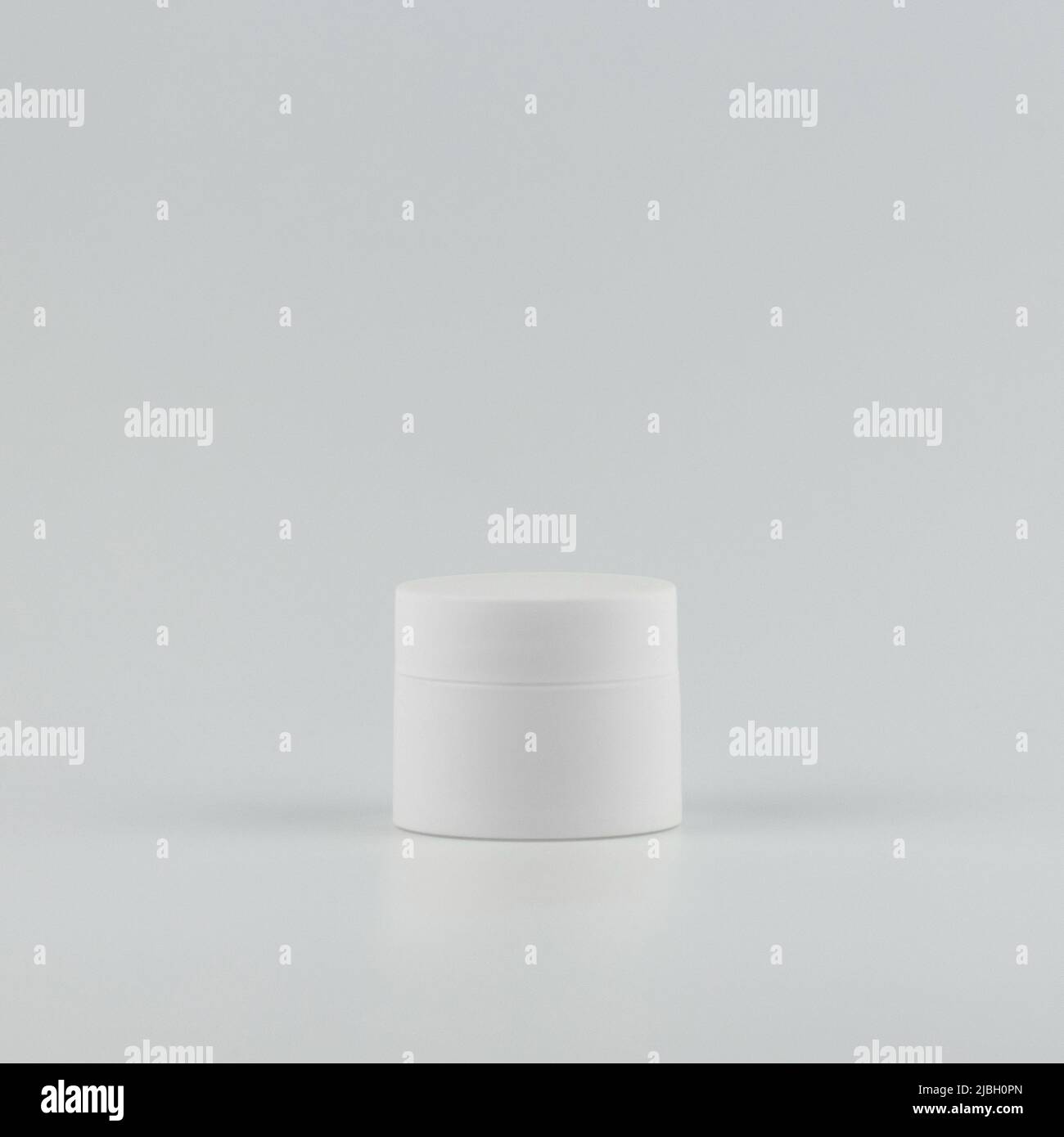 Unbranded white plastic jar for cosmetics products. Skincare and ...