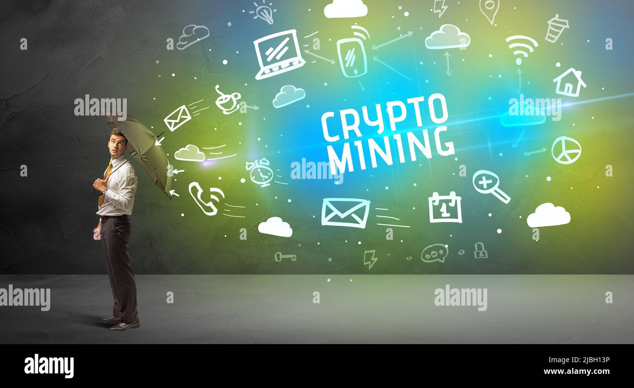 Businessman defending with umbrella, modern technology concept Stock ...