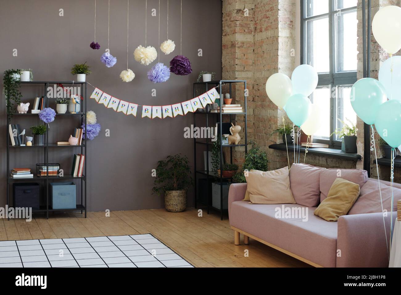 Horizontal image of modern domestic room decorated with helium balloons ...