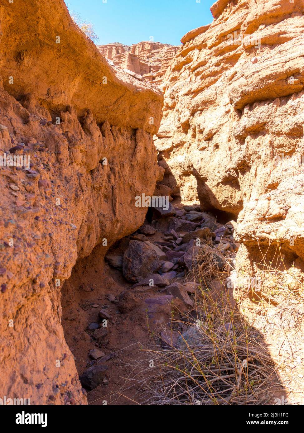 Red rocks and a passage between rocks. Clay canyons. Issyk-Kul region ...