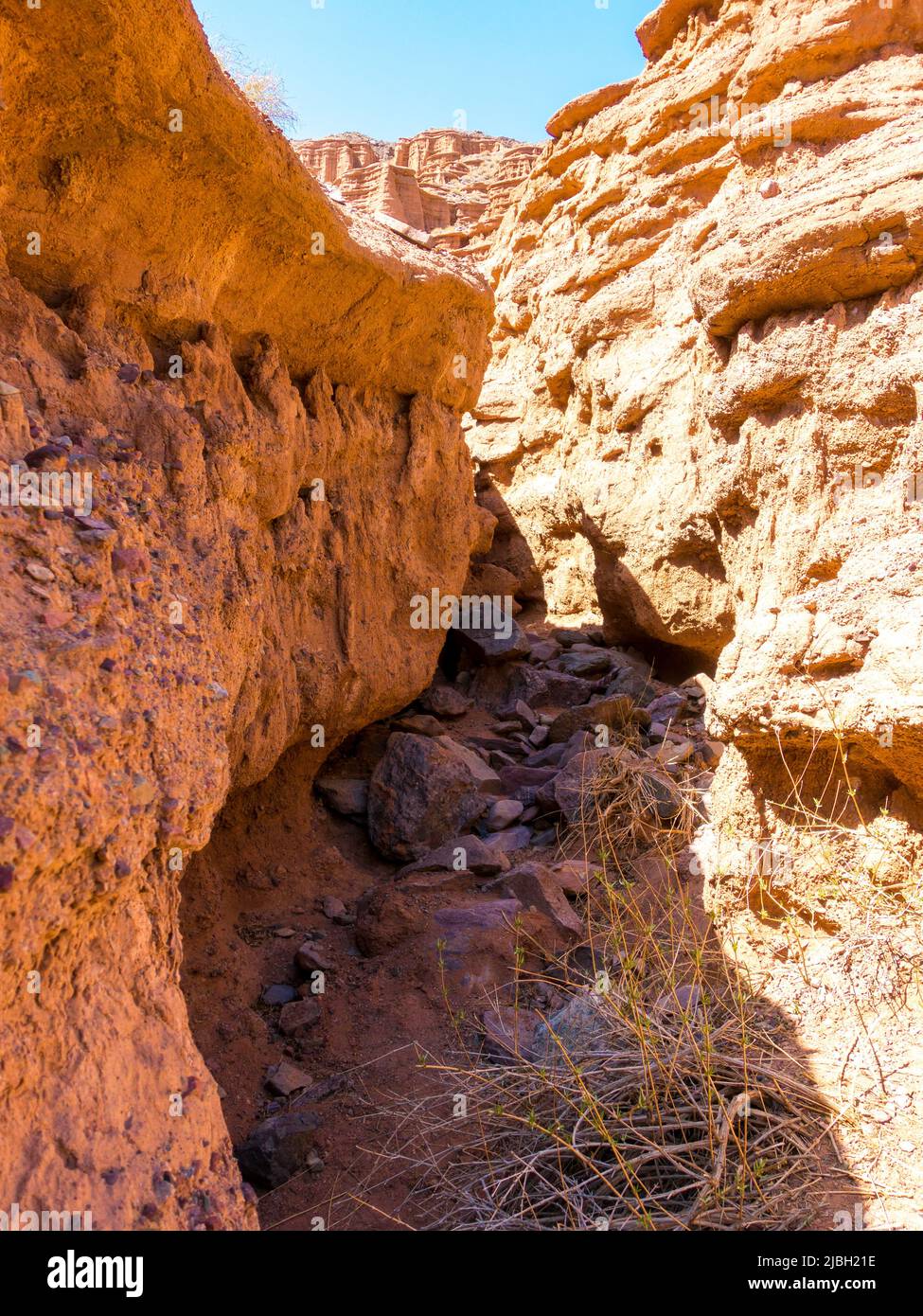 Red rocks and a passage between rocks. Clay canyons. Issyk-Kul region ...