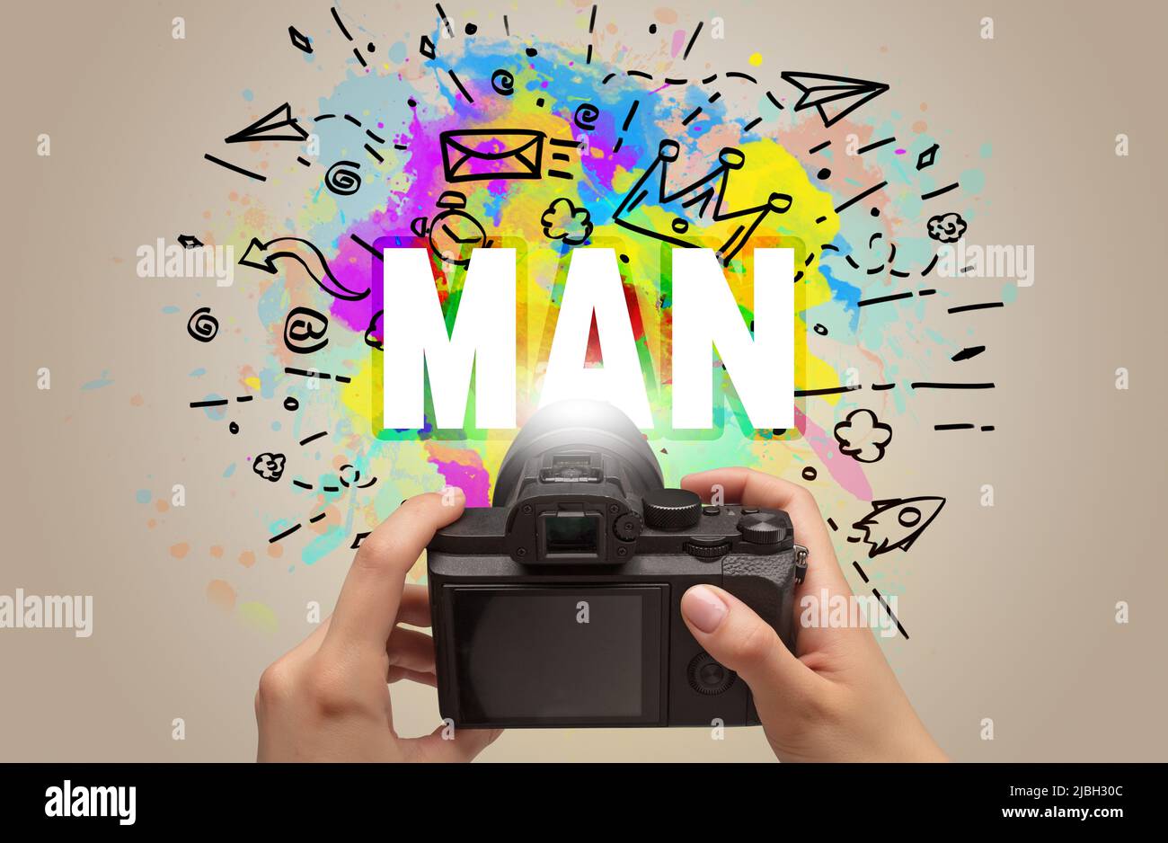 Close-up of a hand holding digital camera with abstract drawing Stock ...