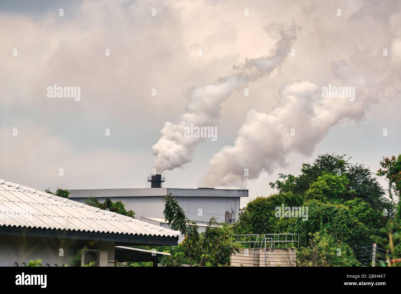 Emission smoke pollution to the air from industrial plant chimney ...
