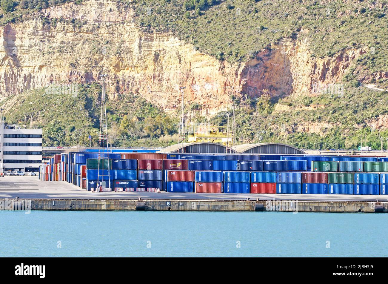 Silos and freight containers in the port of Barcelona, Catalunya, Spain ...