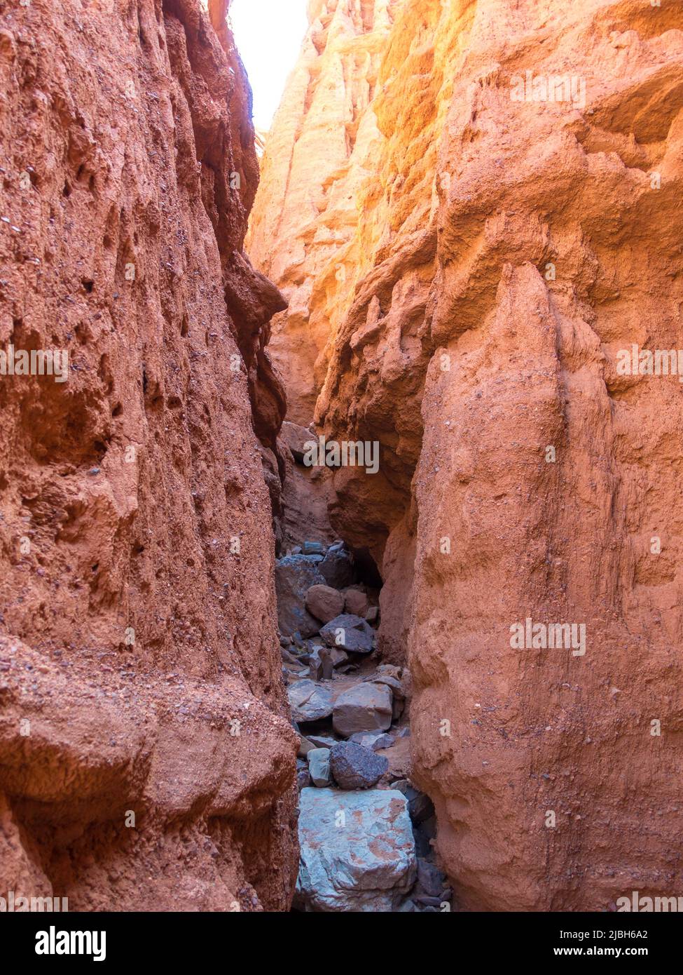 Red rocks and a passage between rocks. Clay canyons. Issyk-Kul region ...