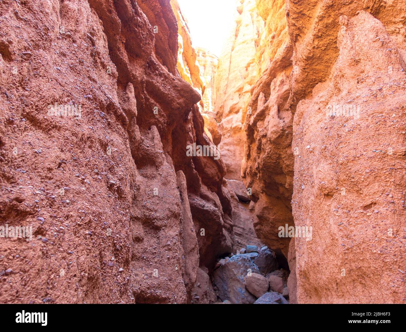 Red rocks and a passage between rocks. Clay canyons. Issyk-Kul region ...