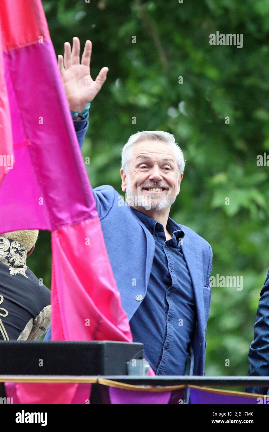 Brian Conley TV personality presenter comedian on an open top bus at ...