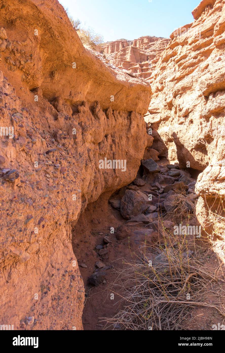 Red rocks and a passage between rocks. Clay canyons. Issyk-Kul region ...