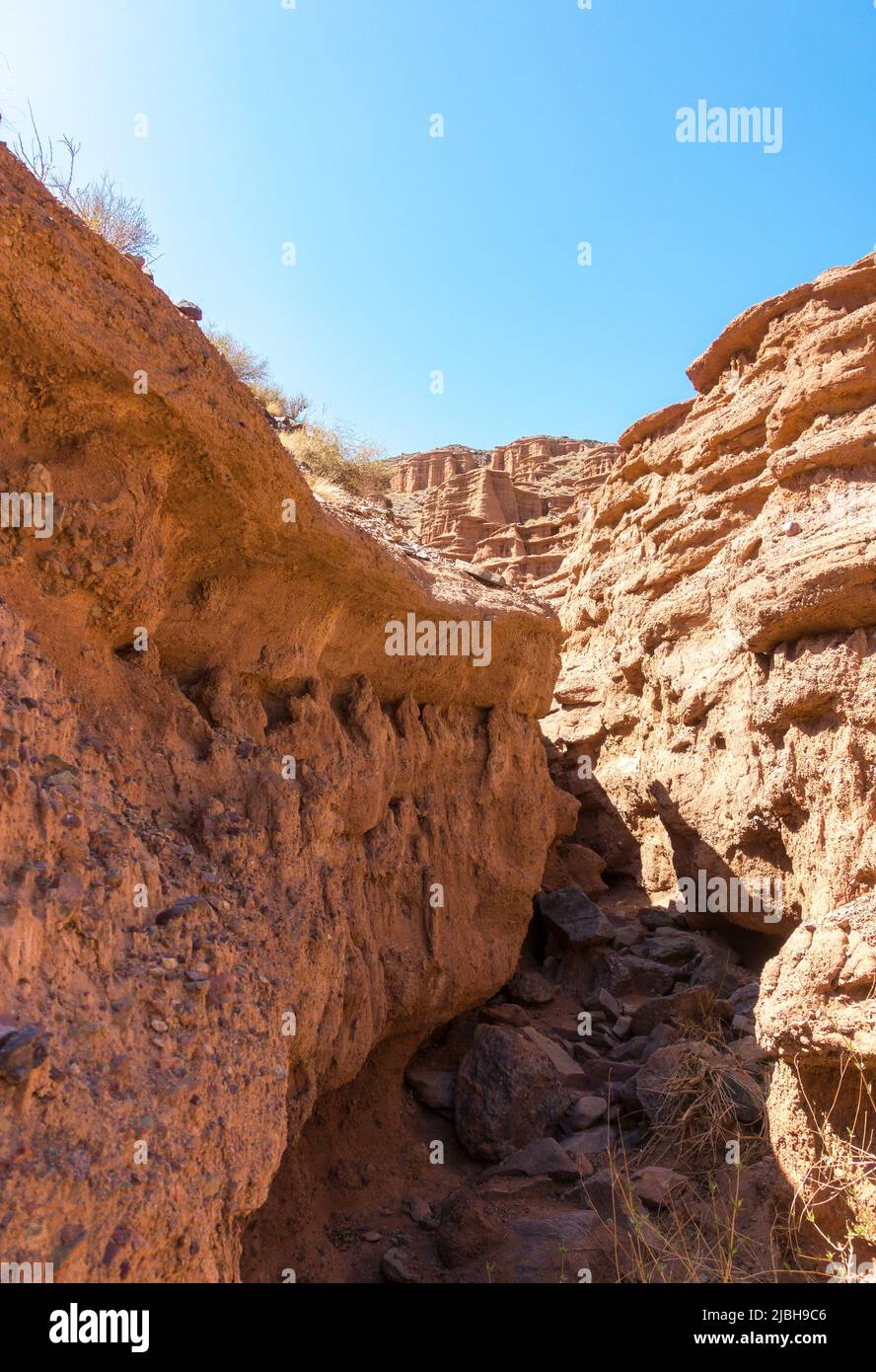Red rocks and a passage between rocks. Clay canyons. Issyk-Kul region ...