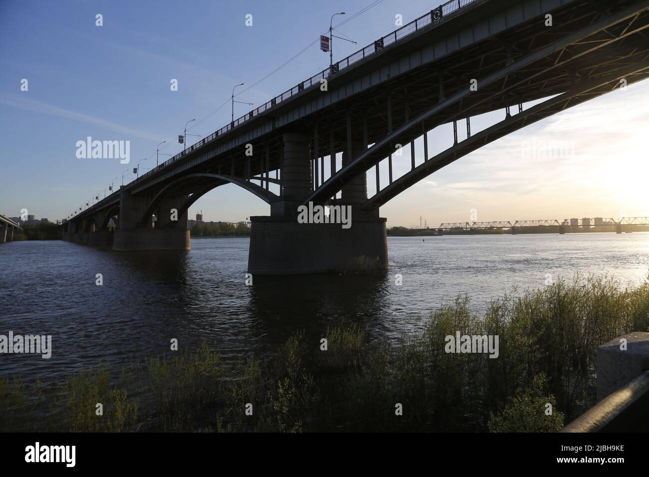 Evening view on the October bridge / Communal bridge across the river ...