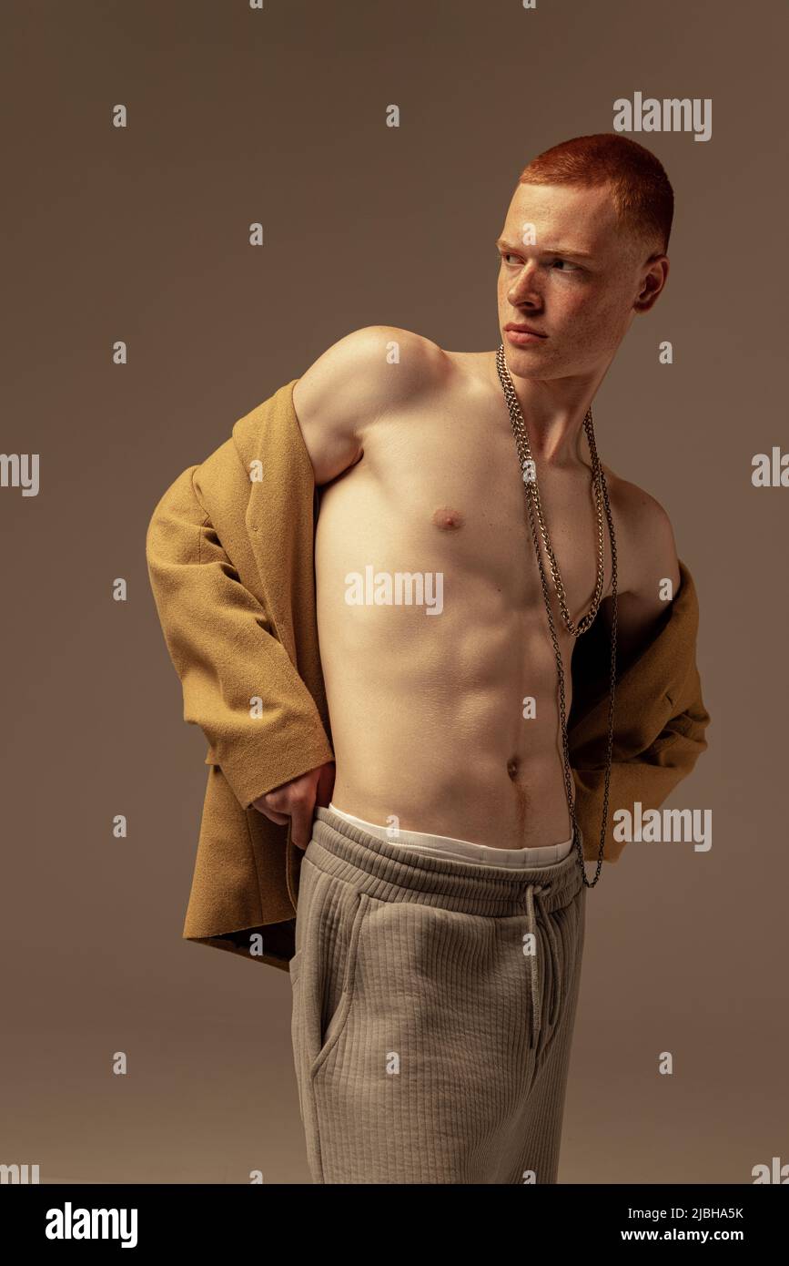 Grey unbuttoned shirt hi-res stock photography and images - Alamy