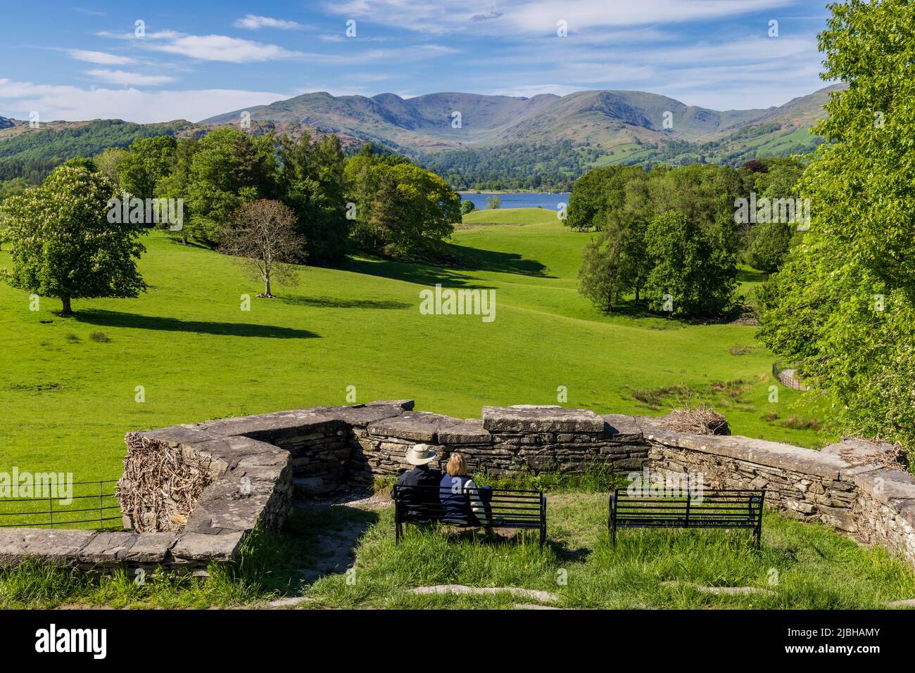 A couple admiring the Windermere landscape at Wray Castle, Lake ...