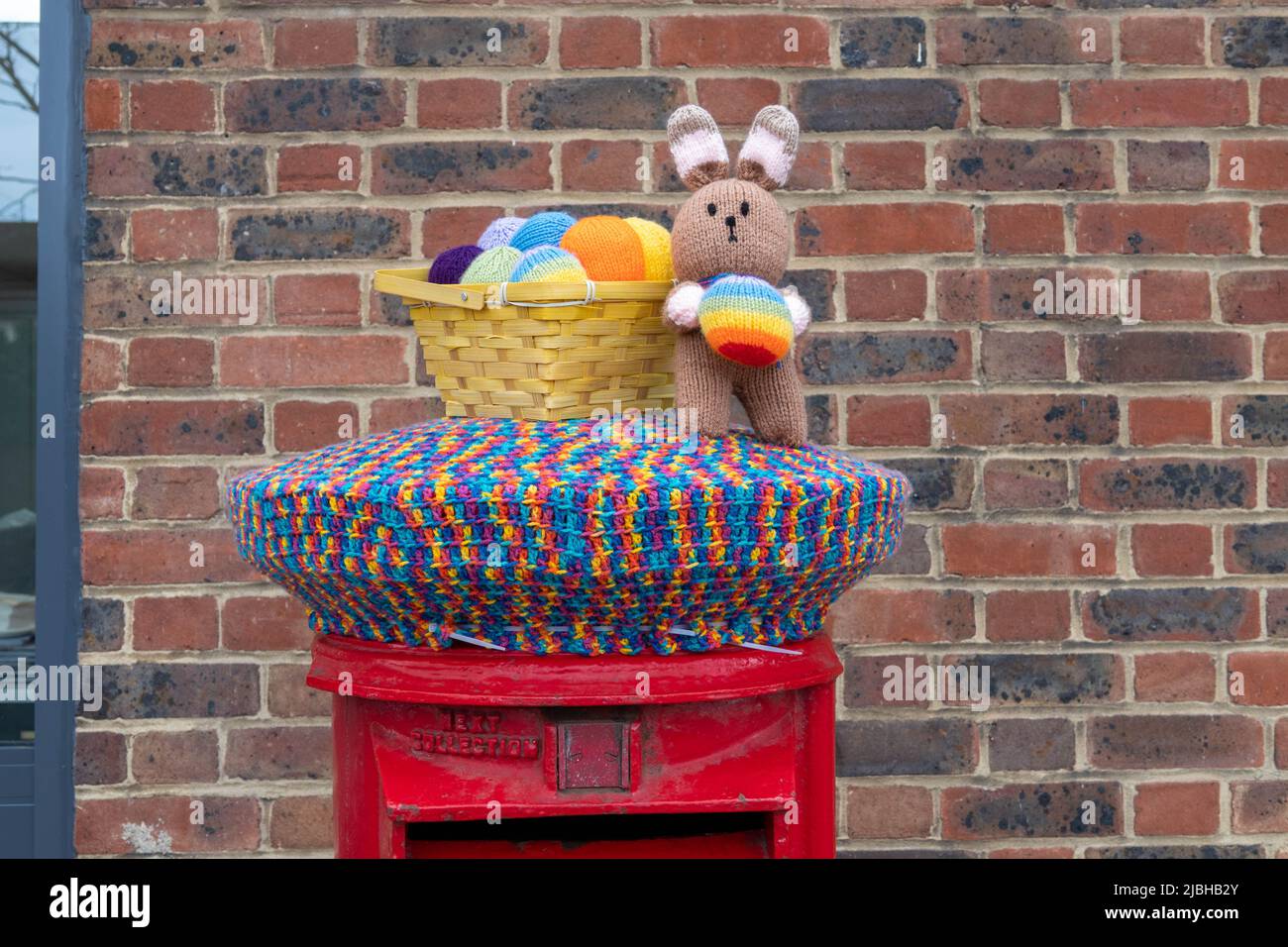 knitted Easter Bunny with eggs post box topper Stock Photo - Alamy