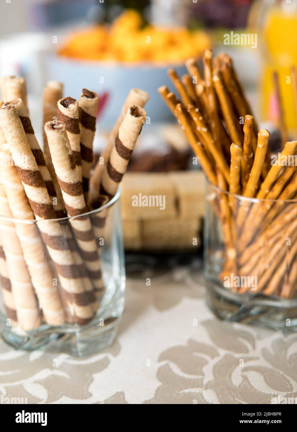 salty sticks and wafers on a table ready to be eaten at a party Stock ...