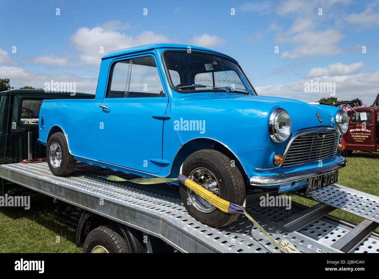 Mini pickup truck on the back of a trailer. Heskin Steam Rally 2022 ...