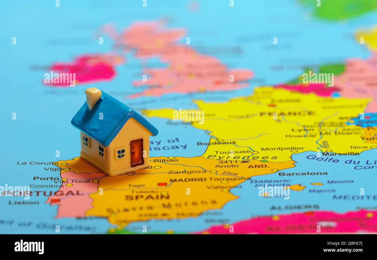 Small toy house on the map of Spain Stock Photo - Alamy