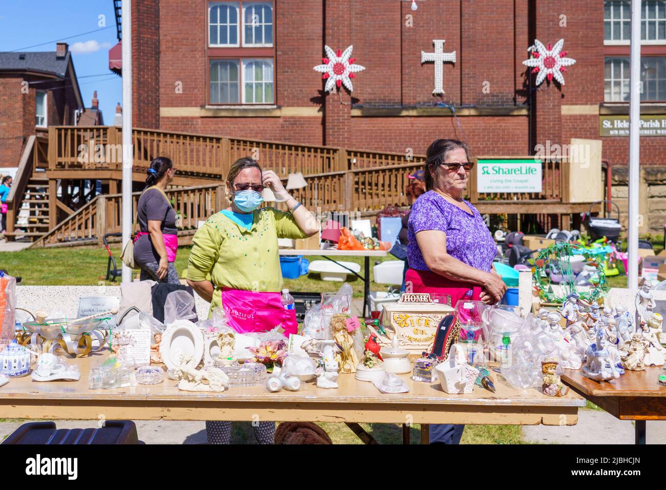 Women selling vintage objects in the grounds of St. Helen's Parish ...