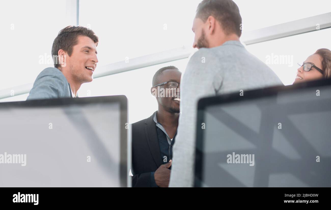 business colleagues, talking during a working break Stock Photo - Alamy