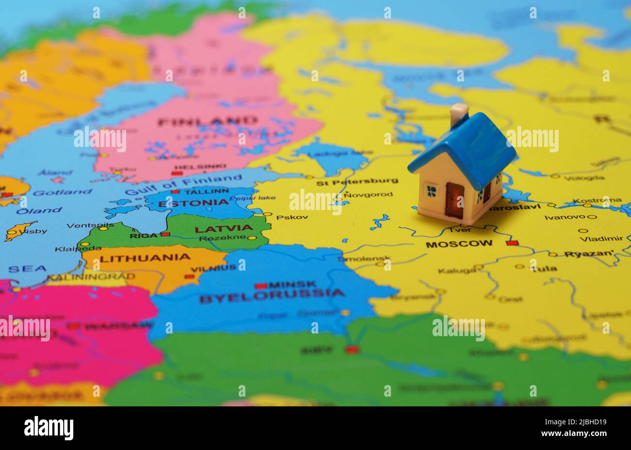 Small toy house on the map of Russia Stock Photo - Alamy