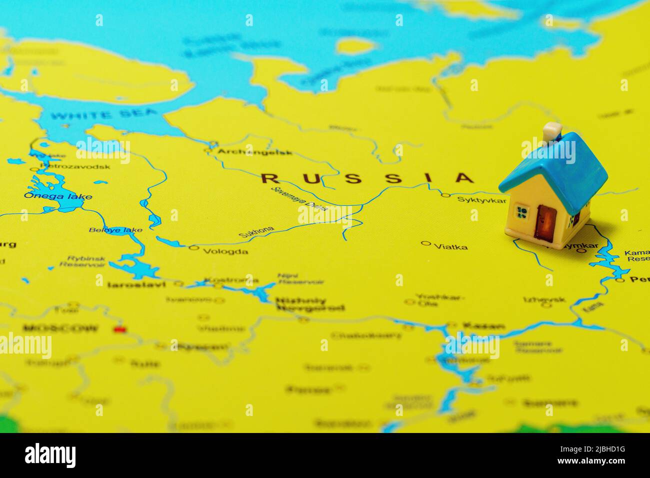 Small toy house on the map of Russia Stock Photo - Alamy