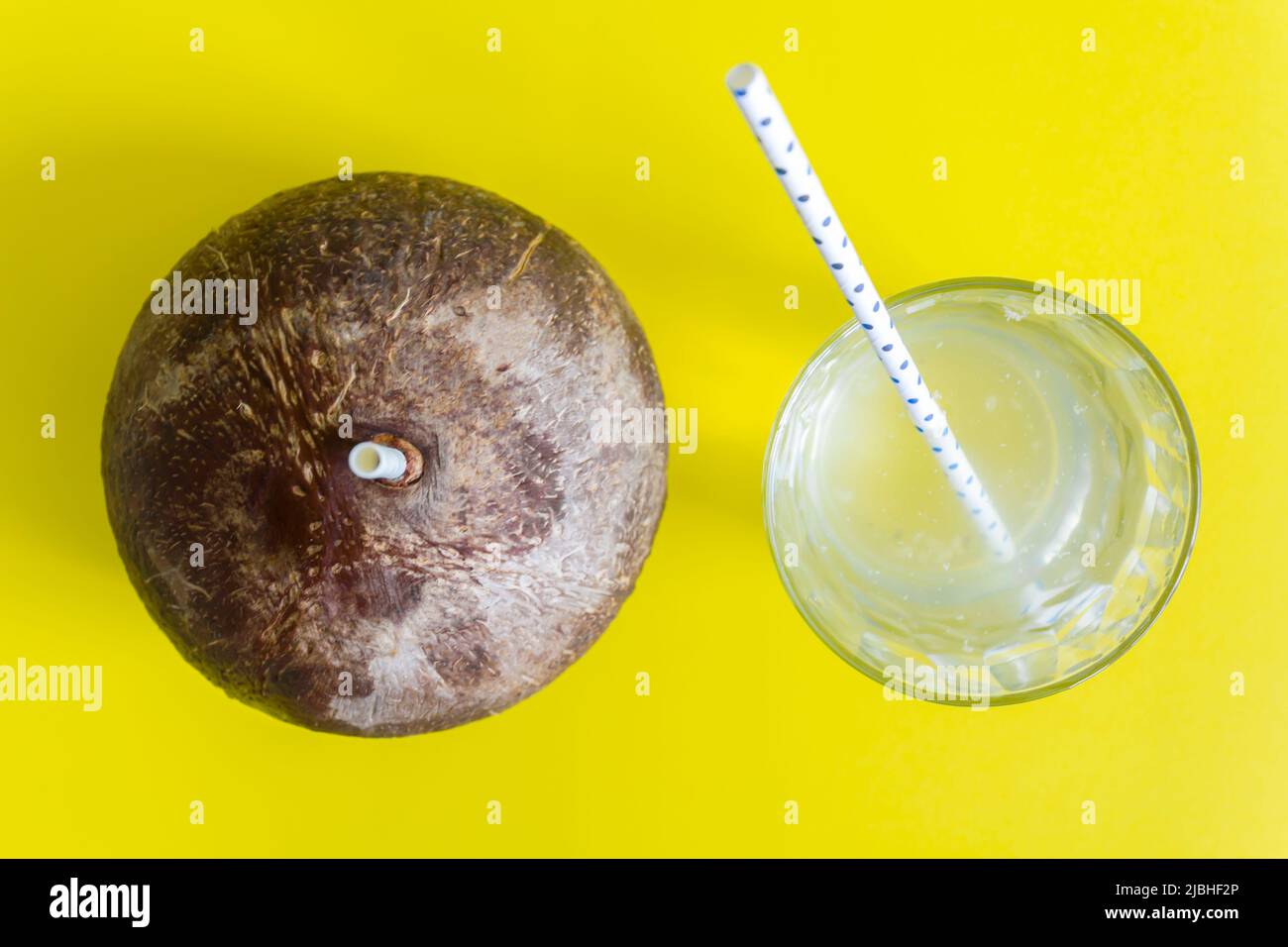 Coconut drinking straw on palm hi-res stock photography and images - Alamy