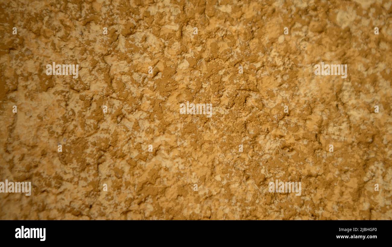 High detailed abstract fragment of yellow drip wall background. Closed ...