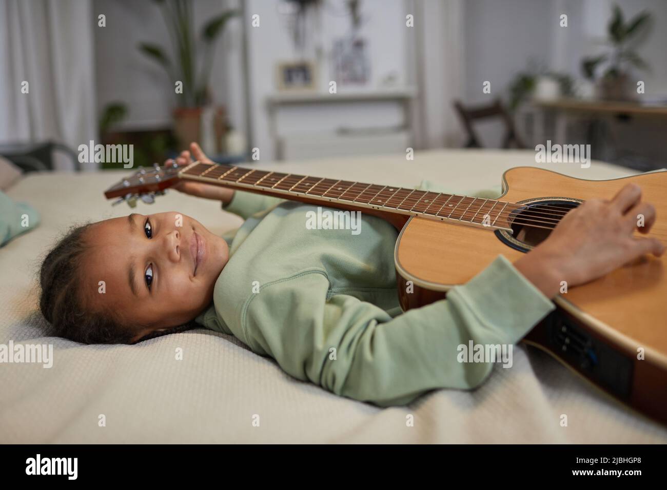African children playing instrument hi-res stock photography and images ...