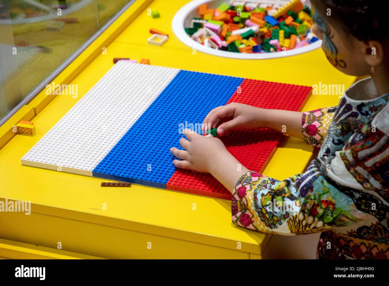 Moscow, Russia. 5th of June, 2022. A girl collects a Lego set in the ...