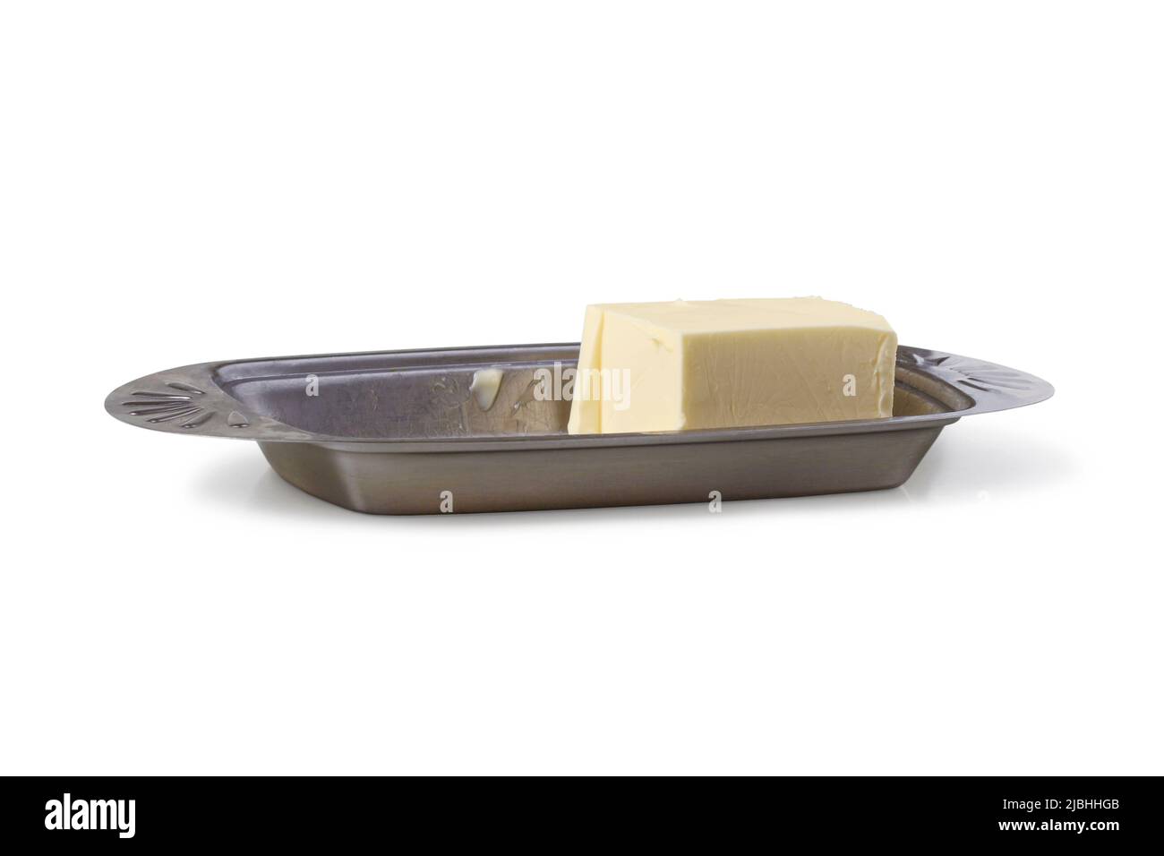 Piece of butter in metal butter dish isolated on white Stock Photo - Alamy