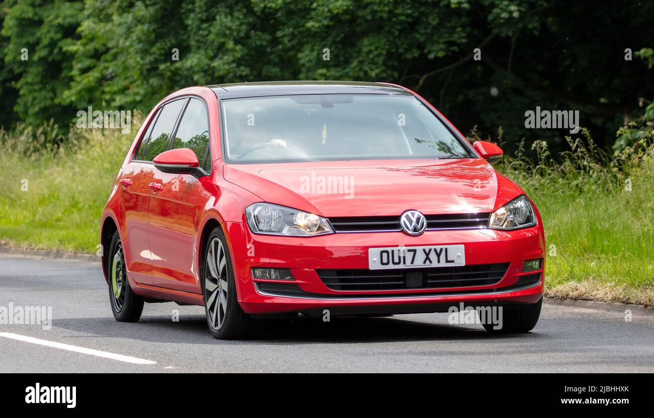 Red volkswagen golf hi-res stock photography and images - Alamy