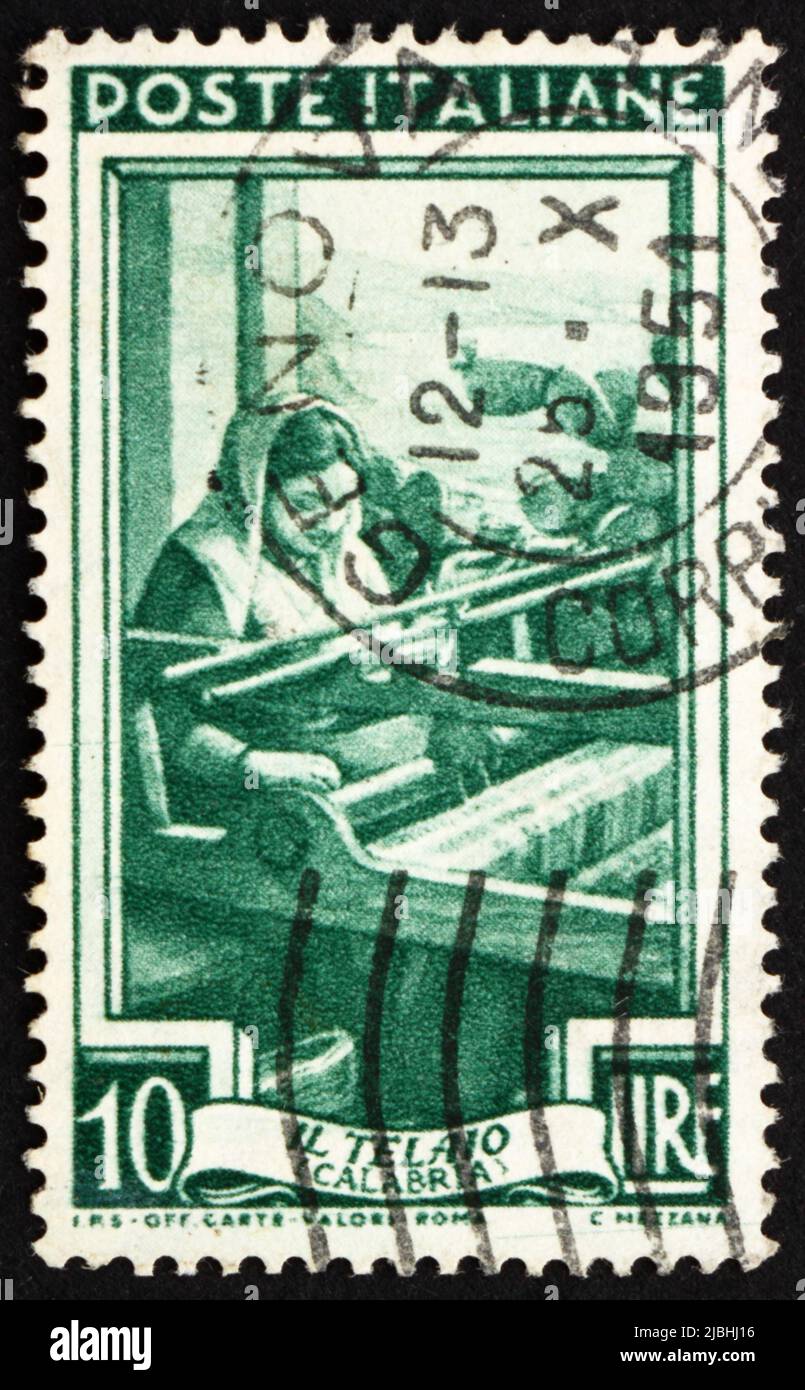 ITALY - CIRCA 1950: a stamp printed in the Italy shows Weaving ...