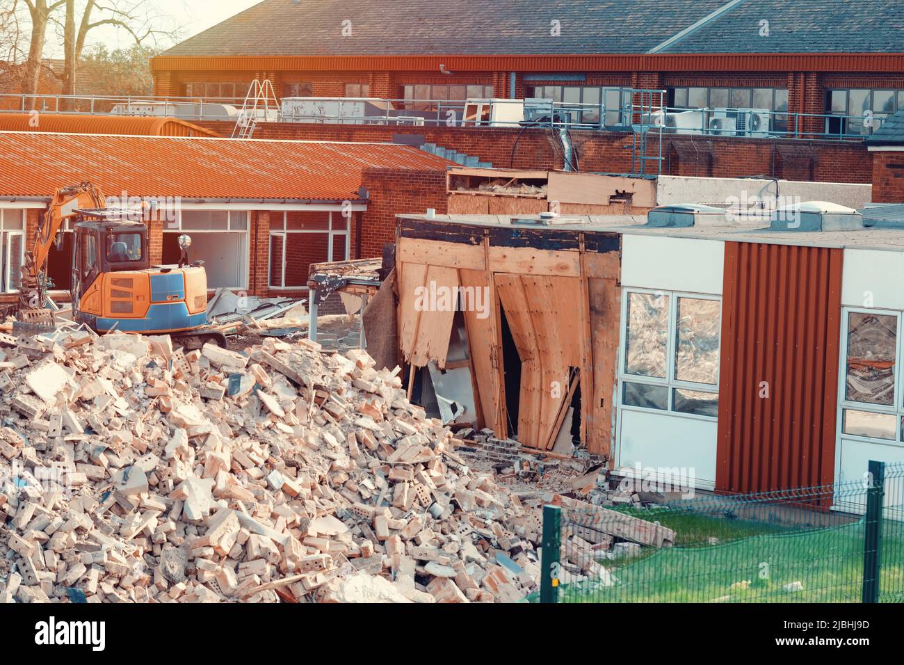 Ruins of a demolished building. Dismantling an old building. Pile of ...