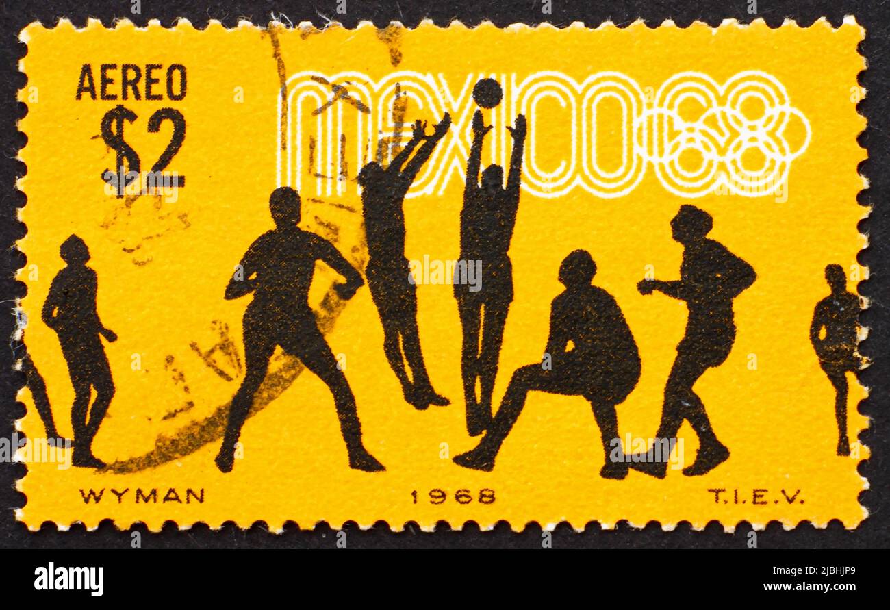 MEXICO - CIRCA 1968: a stamp printed in the Mexico shows Volleyball ...
