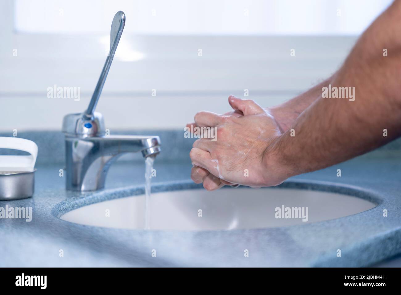 Hand washing with soap and water in the dental clinic Stock Photo - Alamy