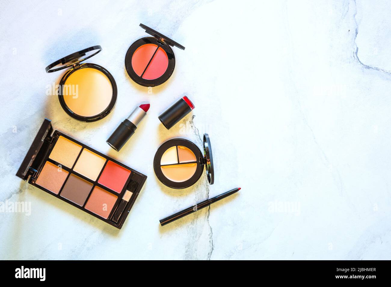 Makeup professional cosmetics on white marble background Stock Photo ...