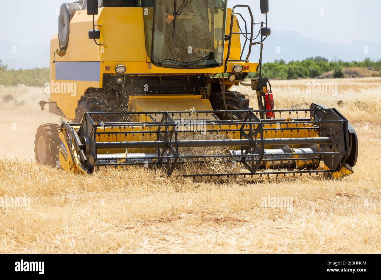 Combine harvester harvesting barley fields Stock Photo - Alamy