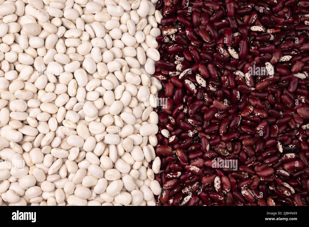 red and white kidney beans background, top view, uncooked beans mixture ...