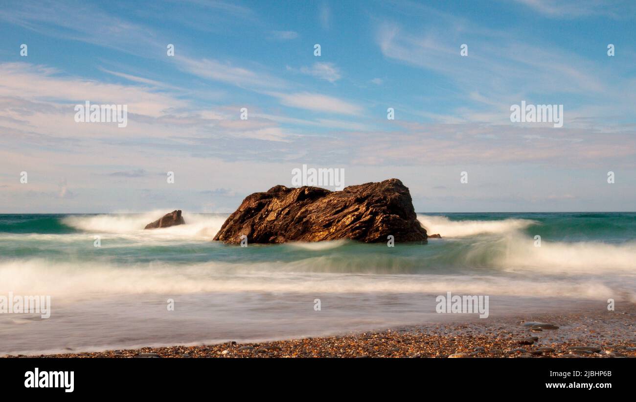 Long exposure image of waves breaking over rocks on the North Cornish ...