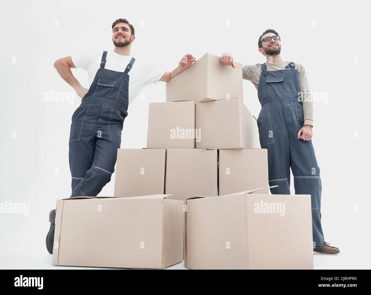 Men carrying a box hi-res stock photography and images - Alamy