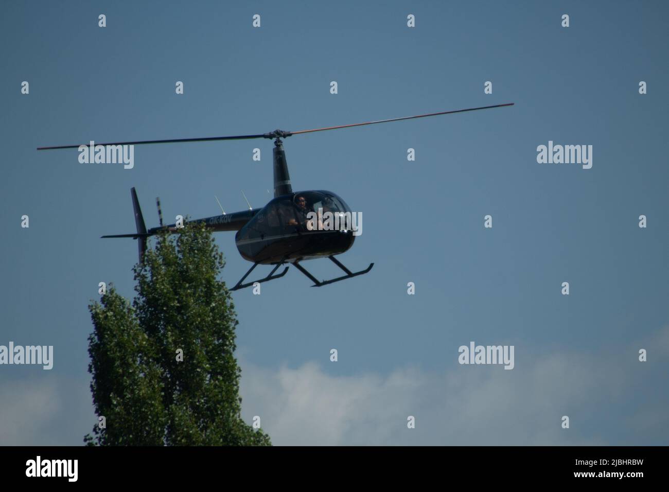 Black Robinson R44 helicopter at Boleradice Stock Photo - Alamy